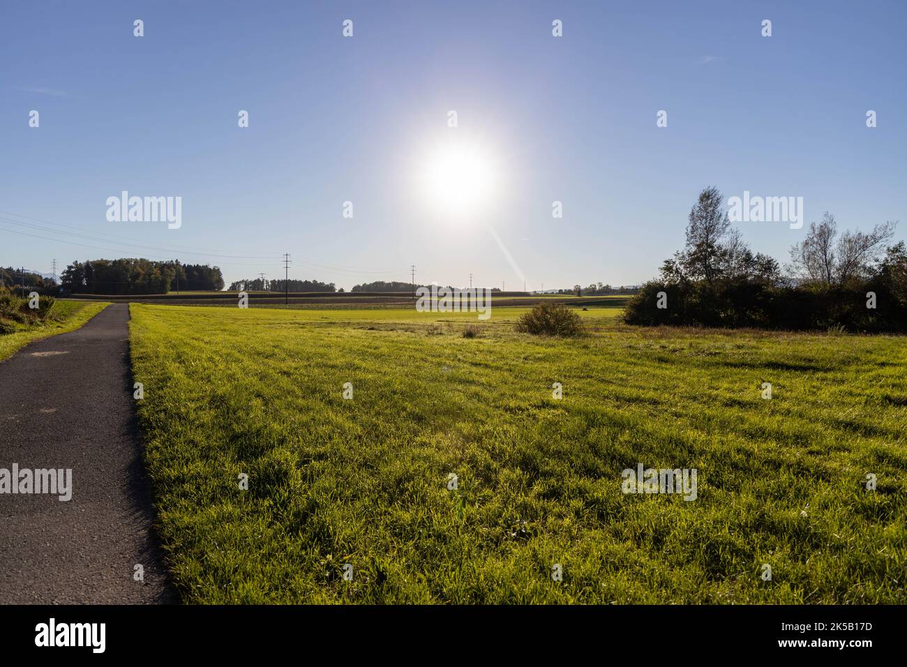 Sun shining on field hi-res stock photography and images - Alamy