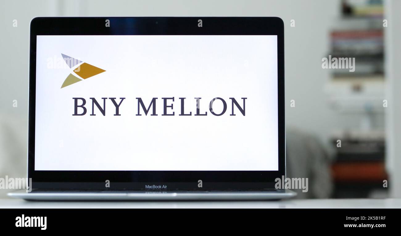 A laptop computer displaying the logo of BNY Mellon, an investment ...