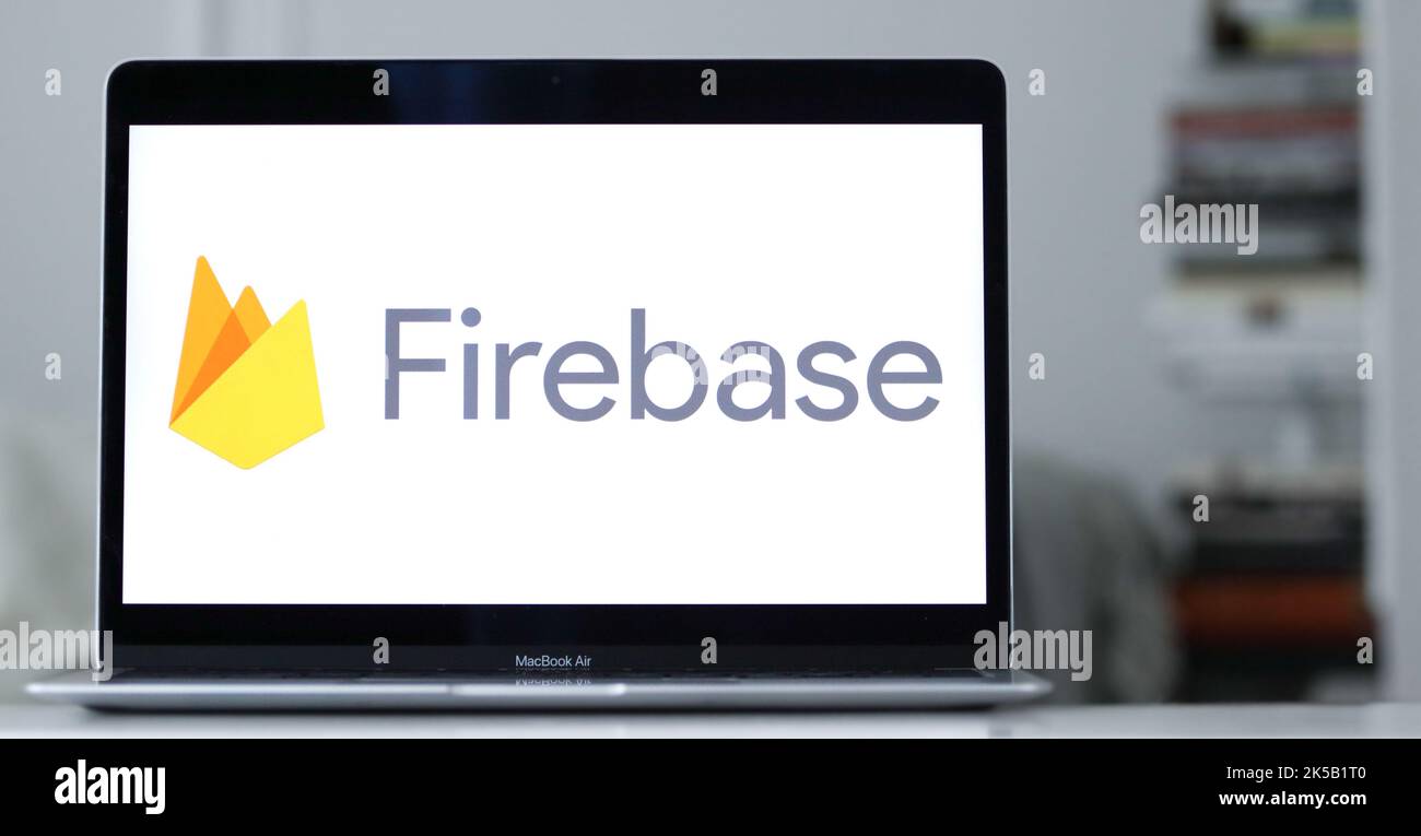 The logo of Google Firebase displayed on the screen of a laptop Stock ...