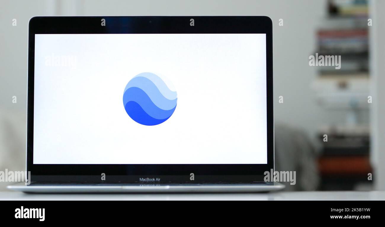 The logo of Google Earth displayed on the screen of a laptop Stock ...