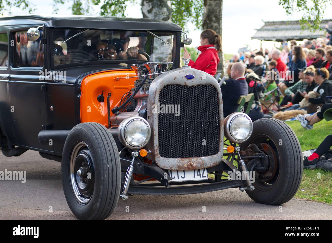 A vintage Ford Model A 1927 car with orange bonnet in a park Stock ...