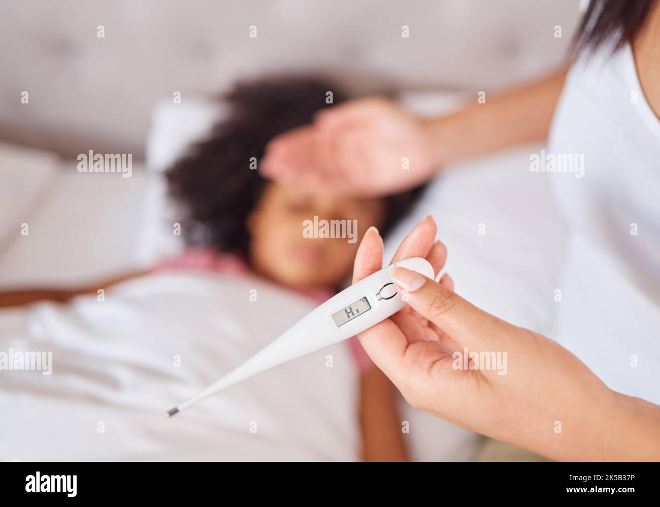 Thermometer, mother and girl in bed, sick with fever and covid risk in ...