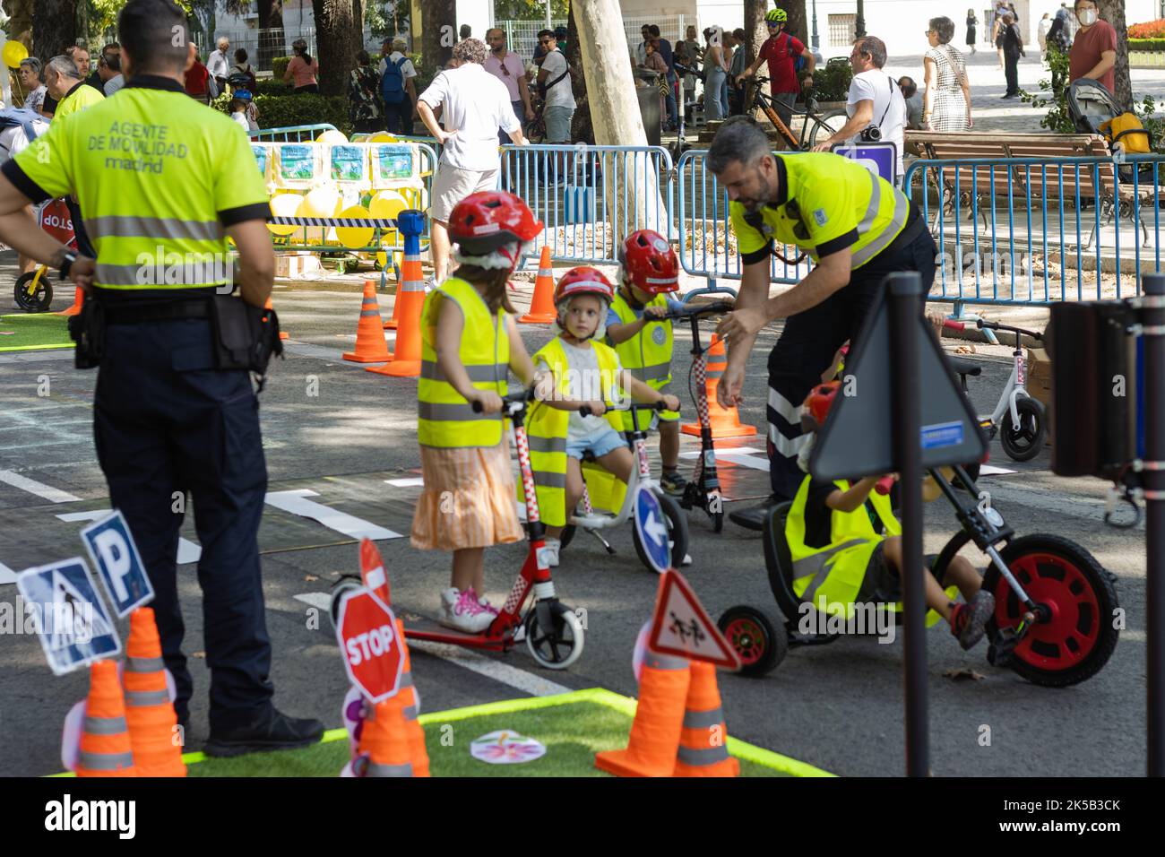 A couple of police and traffic enforcers teaching children the basic ...