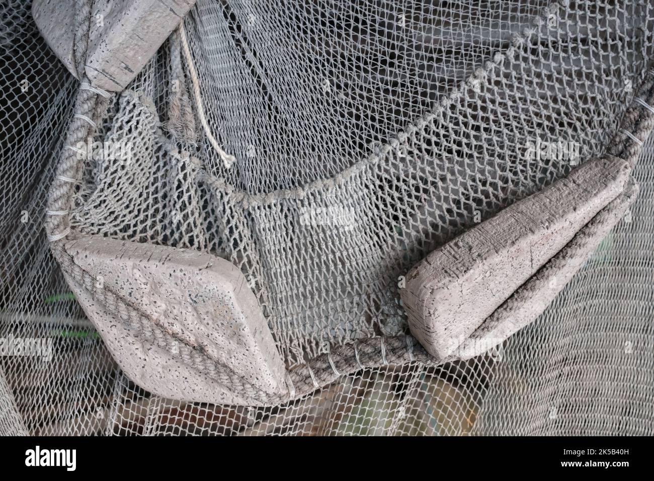 Old fishing nets hung along the walls background Stock Photo - Alamy