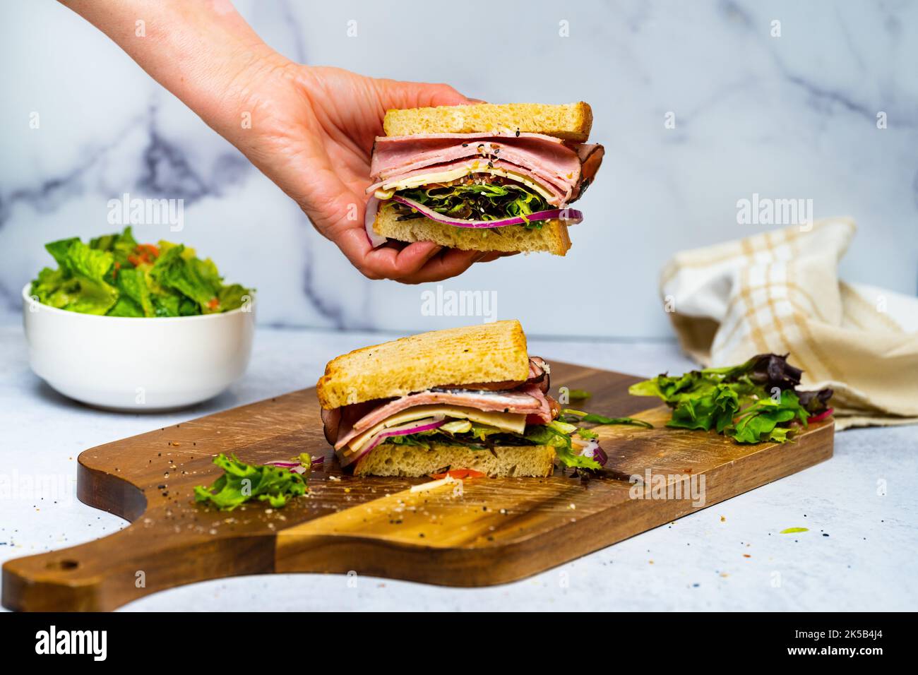 Grabbing sandwich hi-res stock photography and images - Alamy