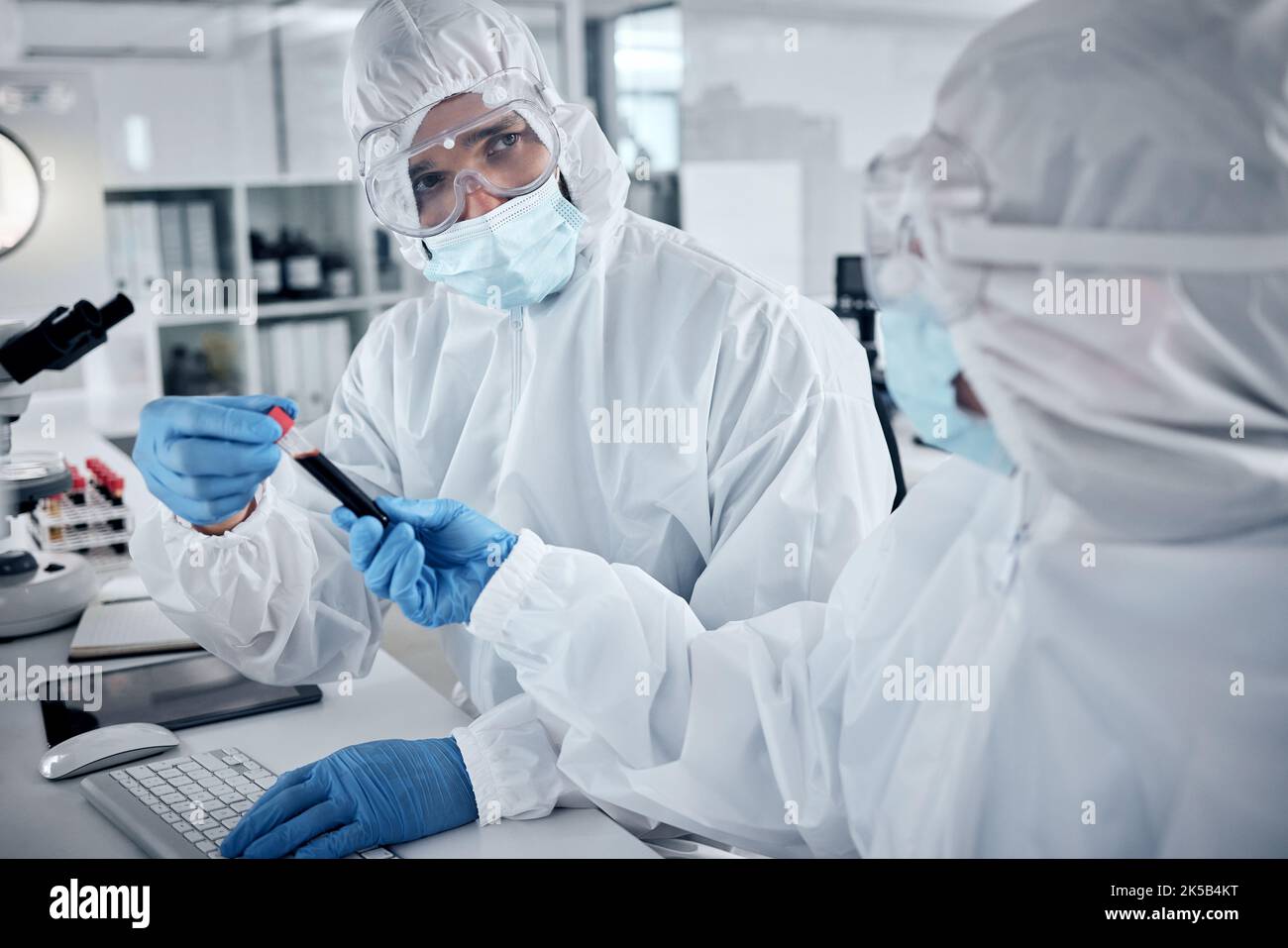 Blood research, medicine or teamwork with doctors or scientist with ...