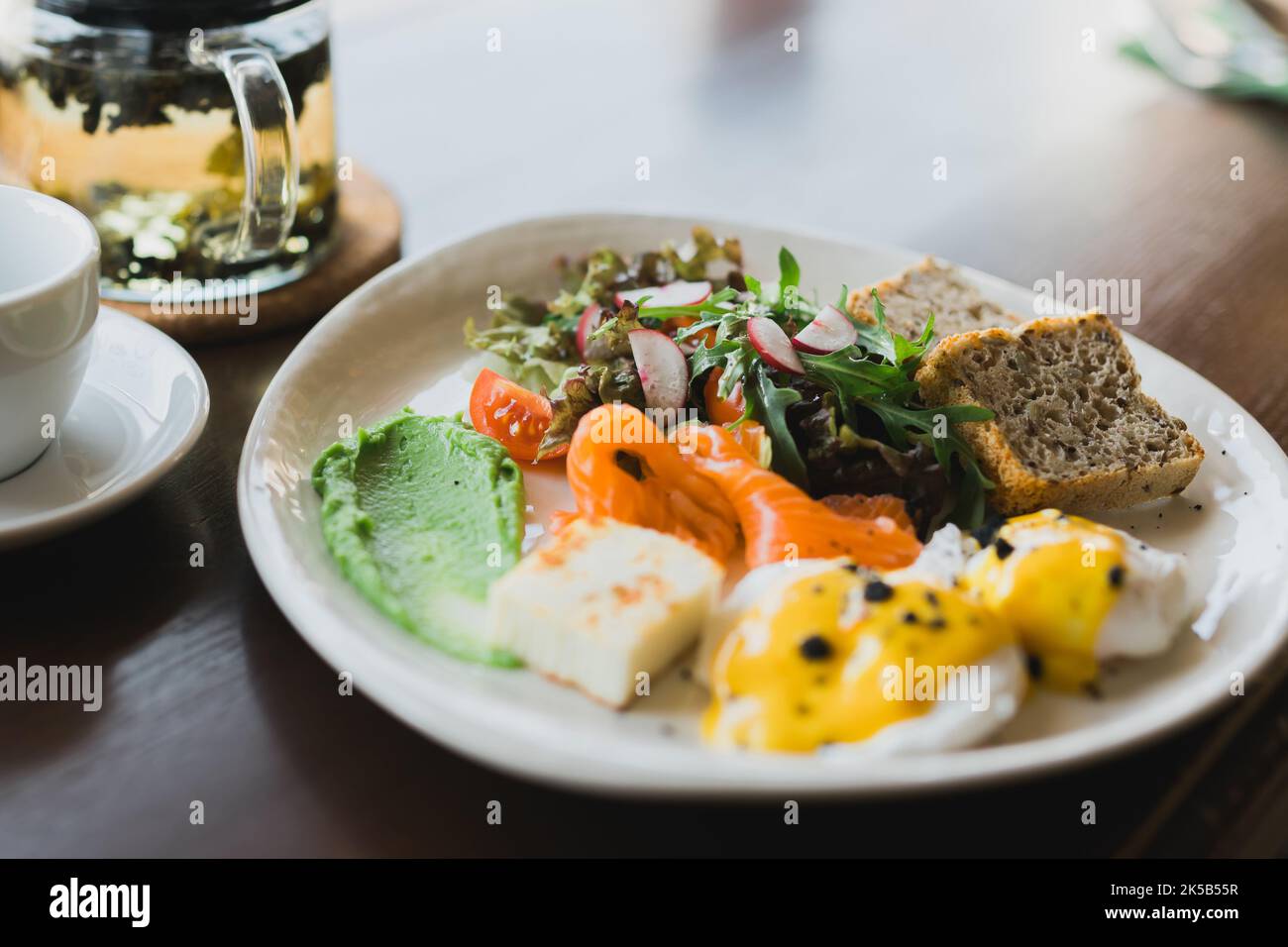 Light and hearty breakfast, brunch with scrambled eggs, toast on grain ...