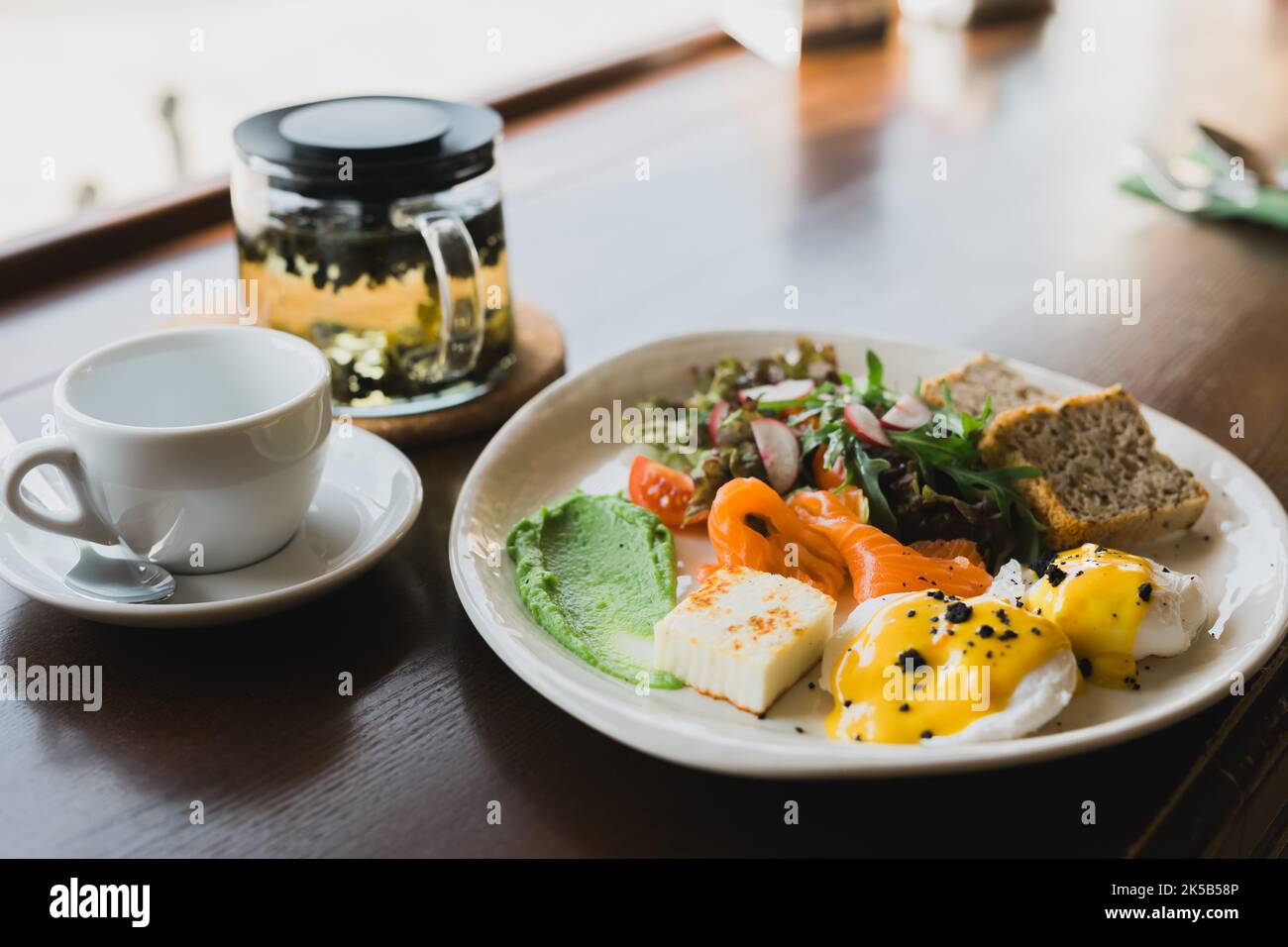 Light and hearty breakfast, brunch with scrambled eggs, toast on grain ...