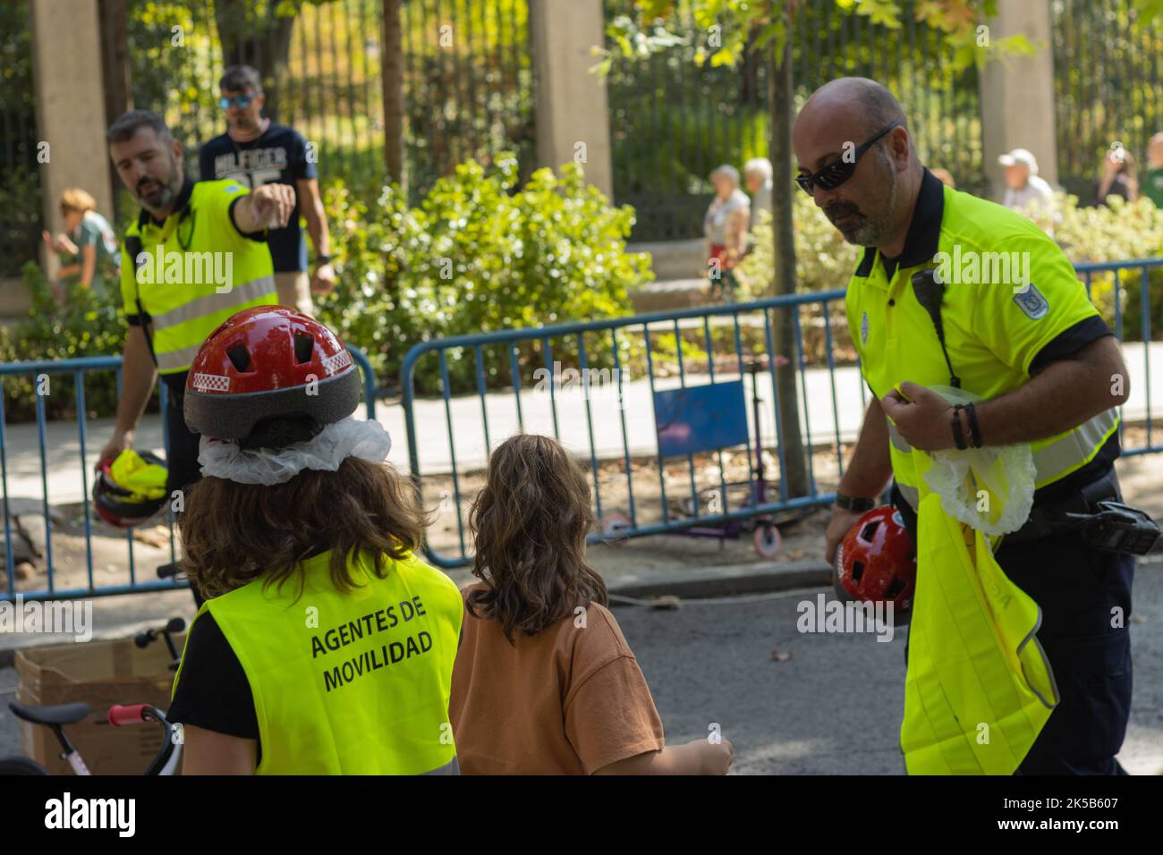 A couple of police and traffic enforcers teaching children the basic ...
