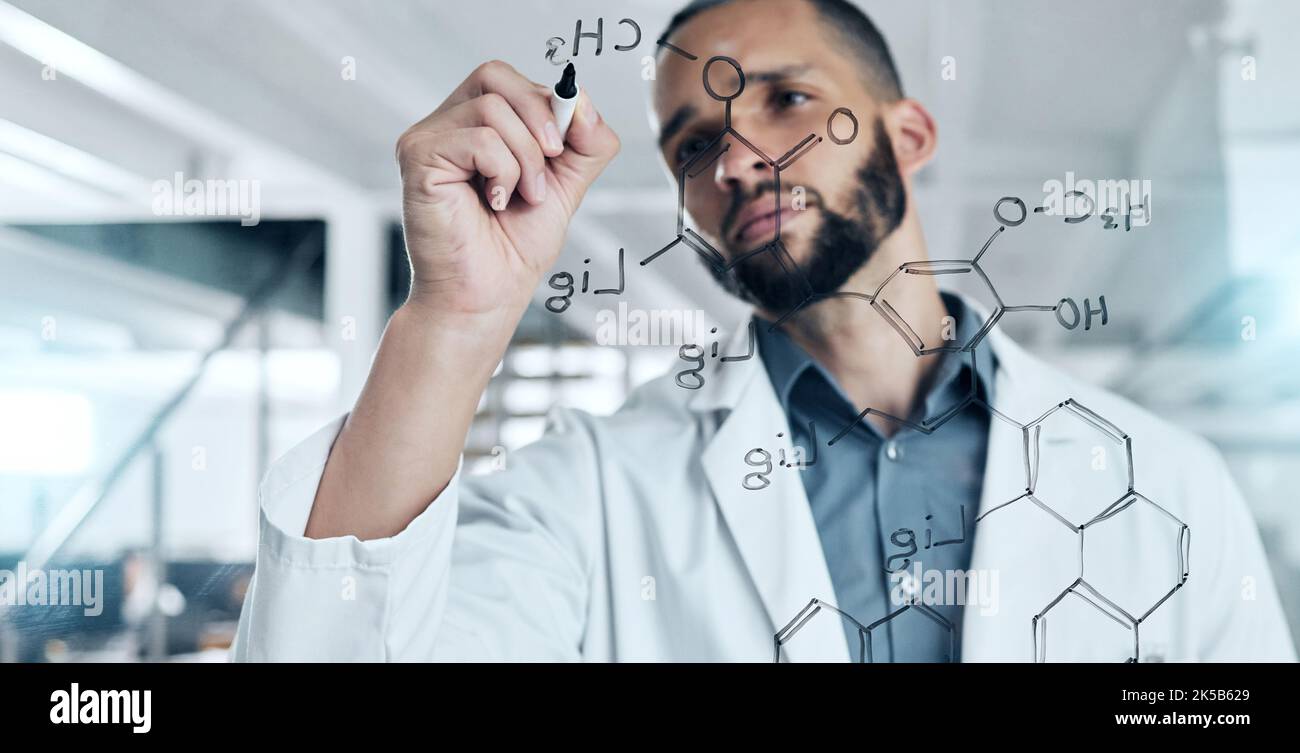 Science, research and formula with a man engineer working and writing ...