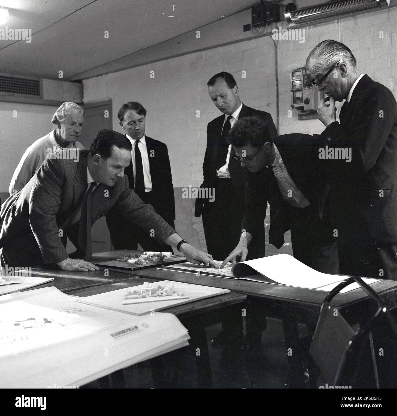 1960s, historical, inside a village hall, parish councilors and local ...