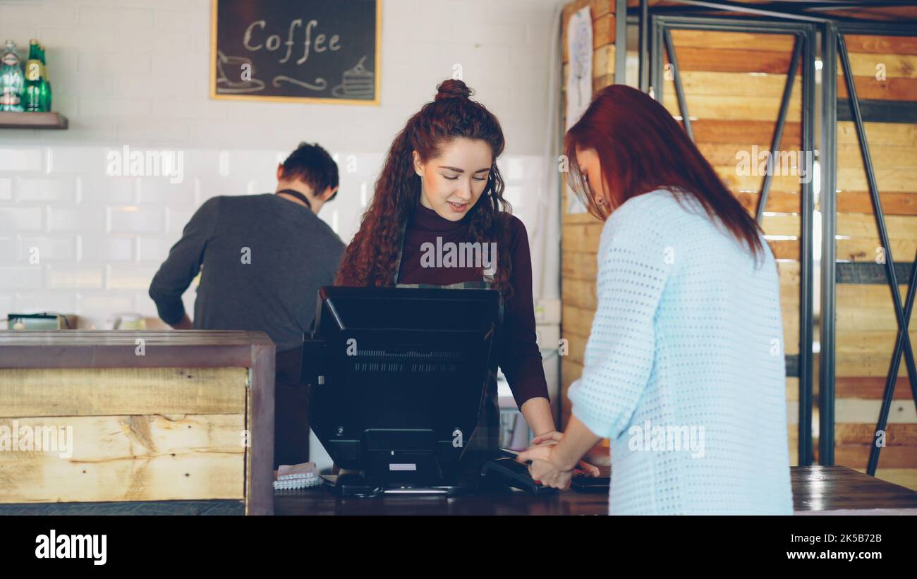 Checkout line queue cashier customers hi-res stock photography and ...