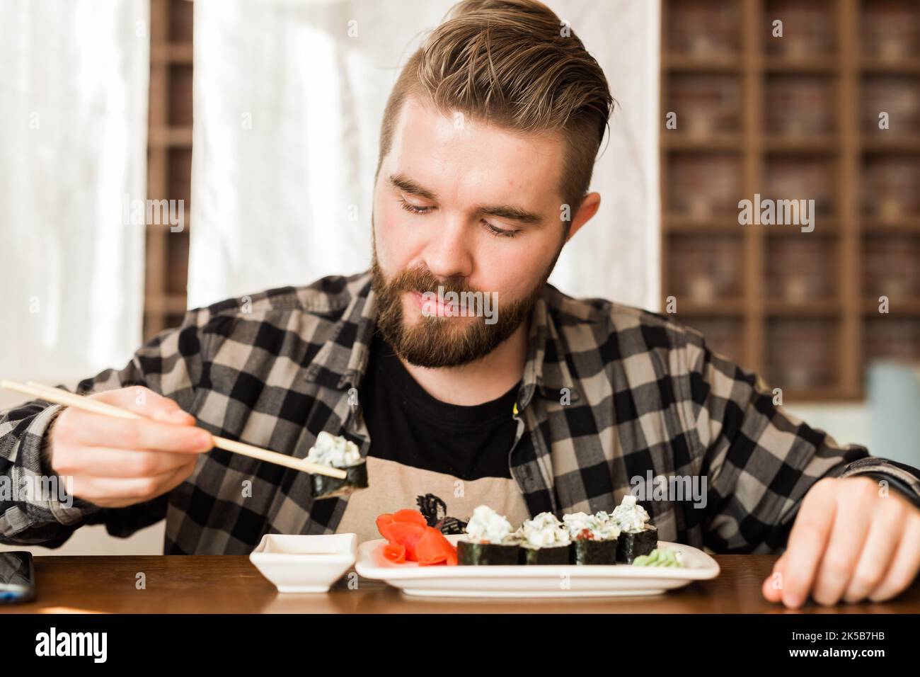 Man holding seaweed hi-res stock photography and images - Alamy