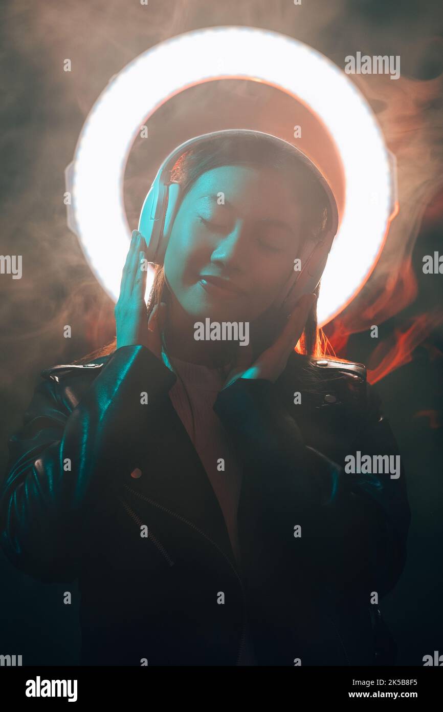 color light people music chill girl in headphones Stock Photo - Alamy