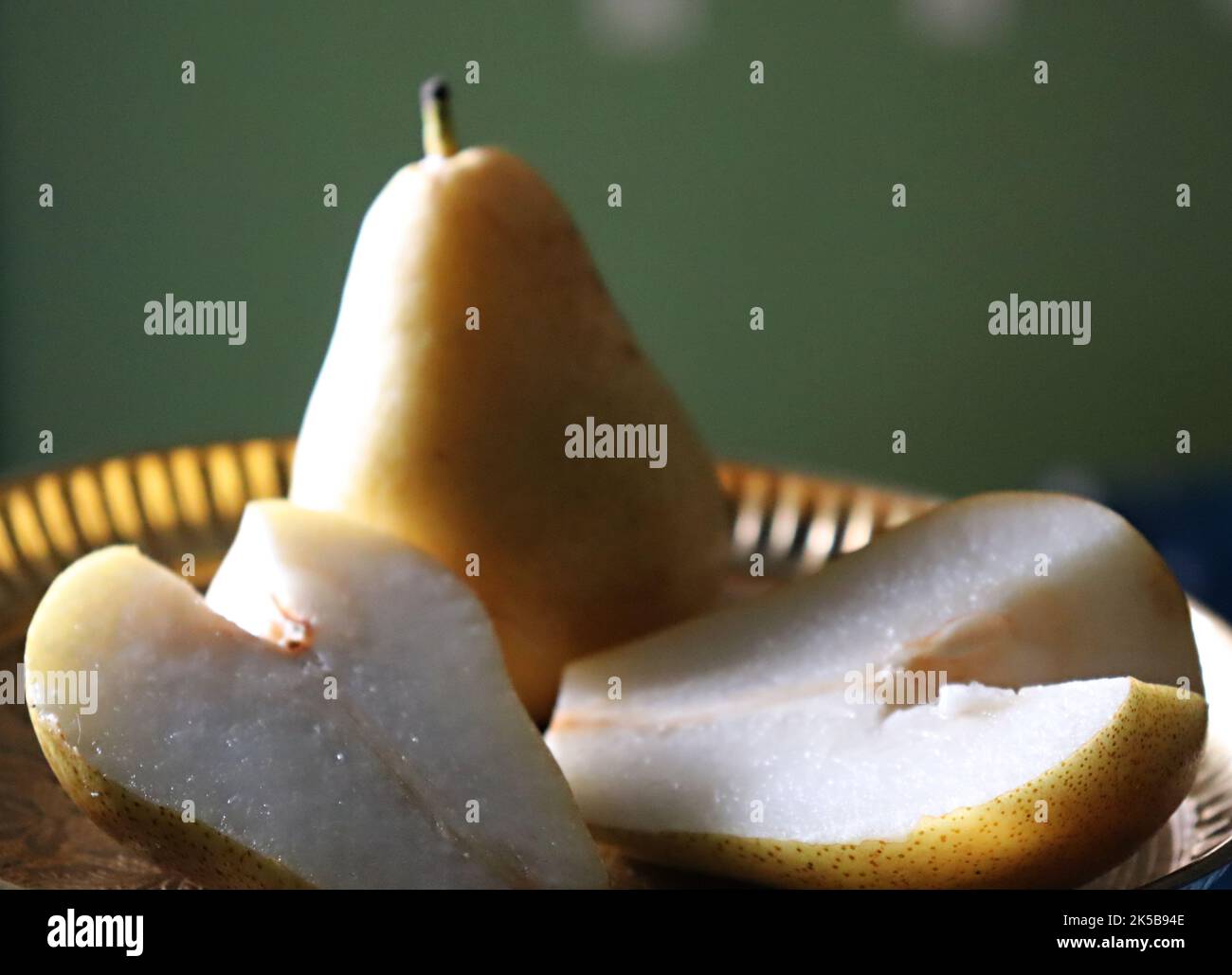 Whole and halved/ Pear fruit /Still life Stock Photo - Alamy