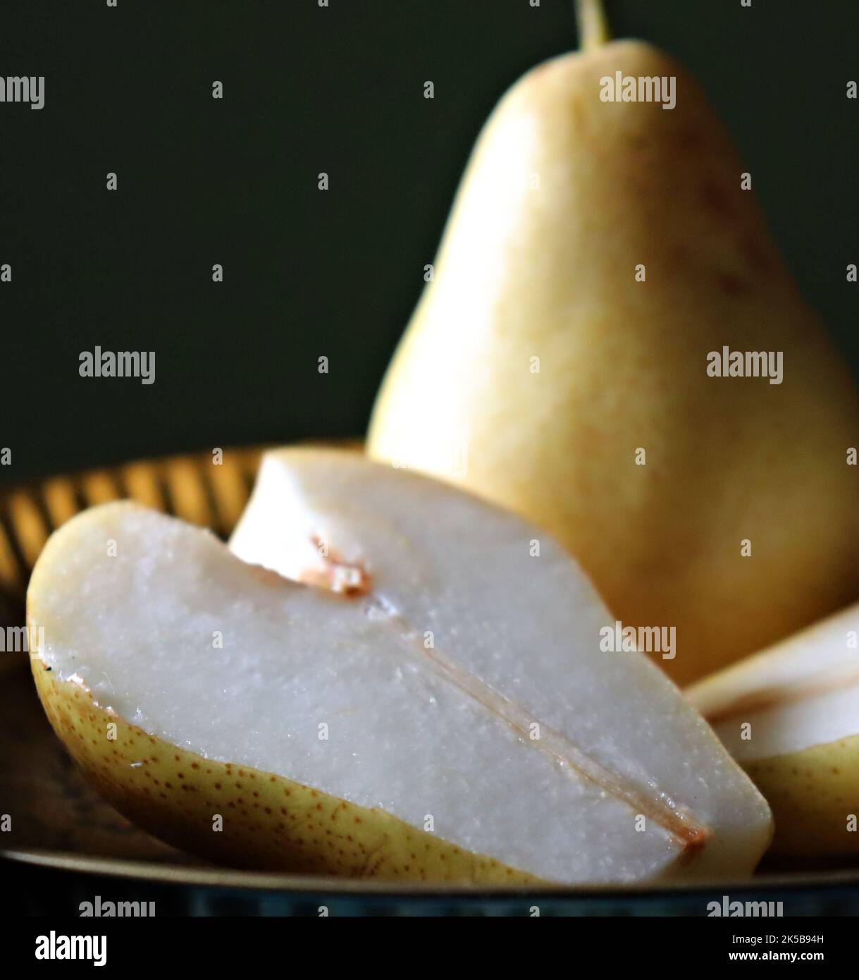 Whole and halved/ Pear fruit /Still life Stock Photo - Alamy