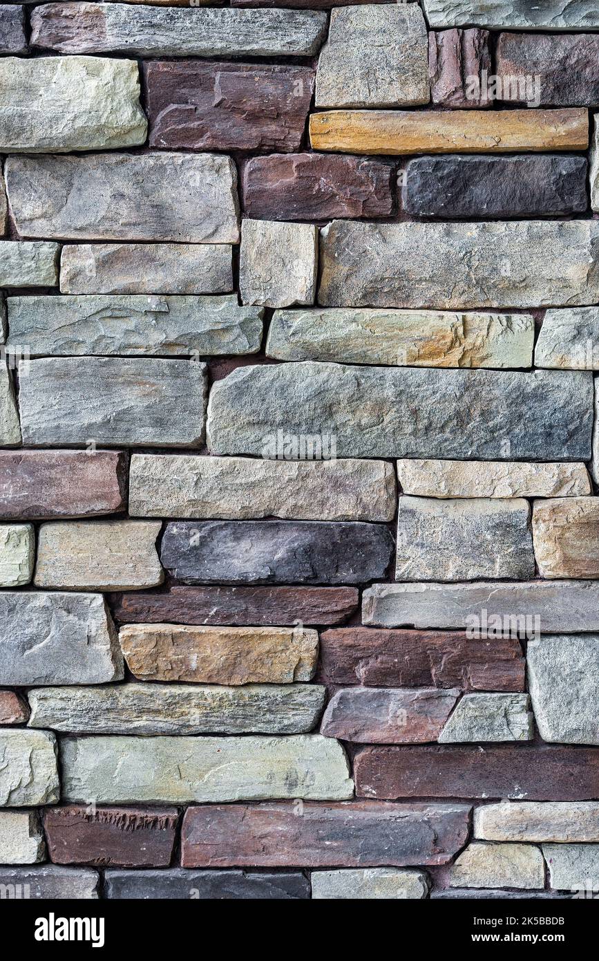 Decorative brown and grey stone setting. Cut stone wall texture Stock ...