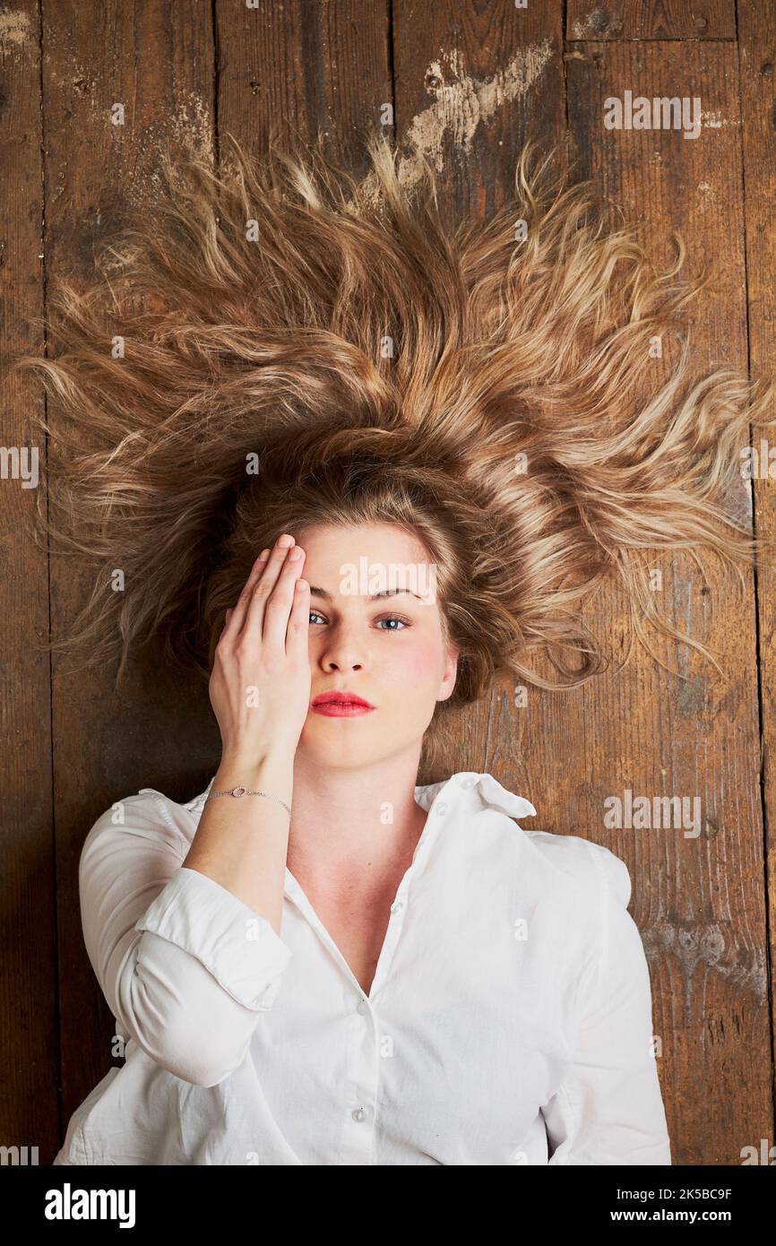 Laying on the floor face down hi-res stock photography and images - Alamy