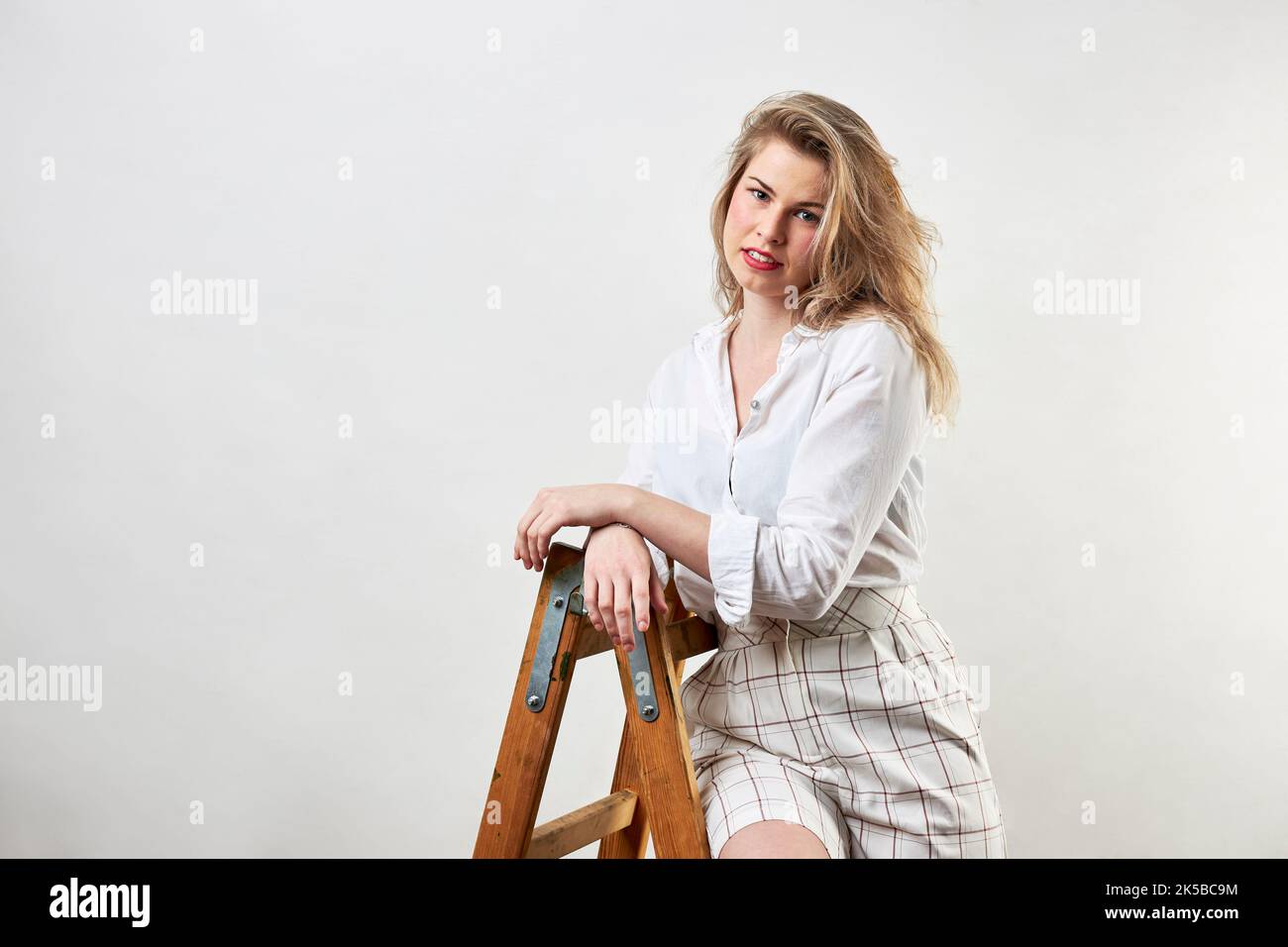 Female model inside studio Stock Photo - Alamy