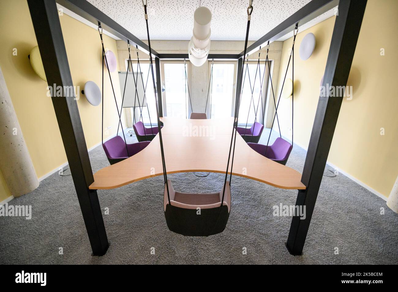 Hamburg, Germany. 07th Oct, 2022. A workspace with chairs hanging from ...