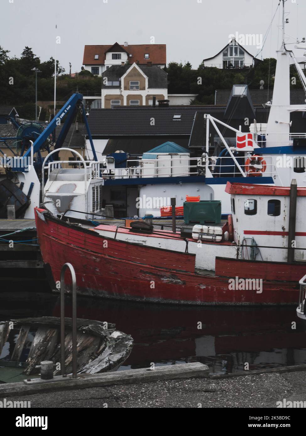 An old fishing boat in a Danish port Stock Photo - Alamy
