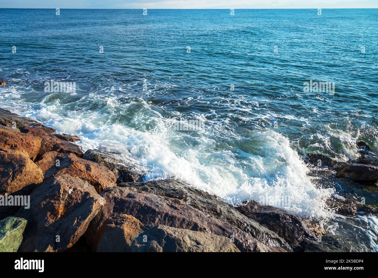 Summer landscape with splashing sea waves. Shore water and wet coastal ...