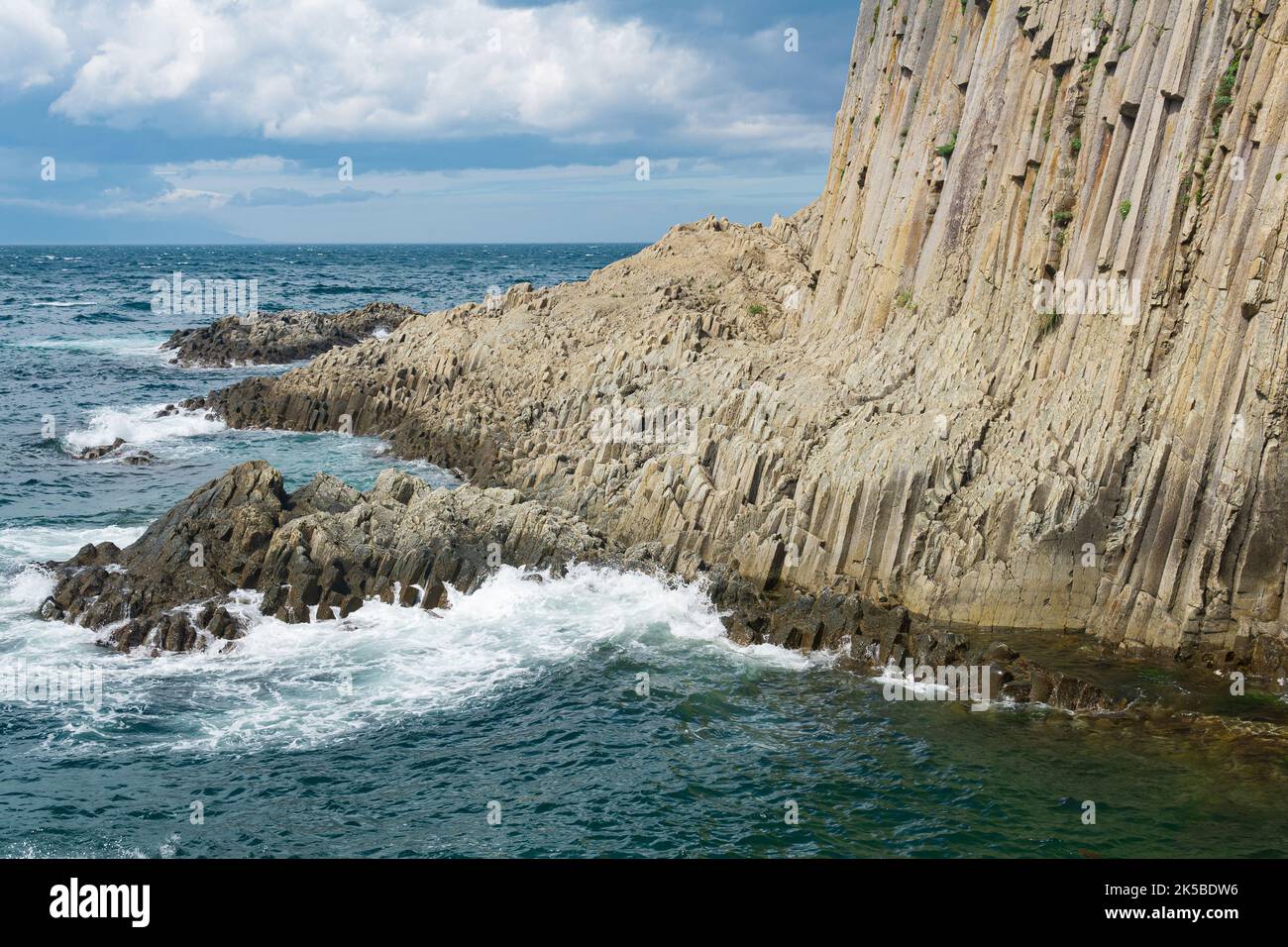 natural landscape with a sheer cliff folded columnar basalt on the ...