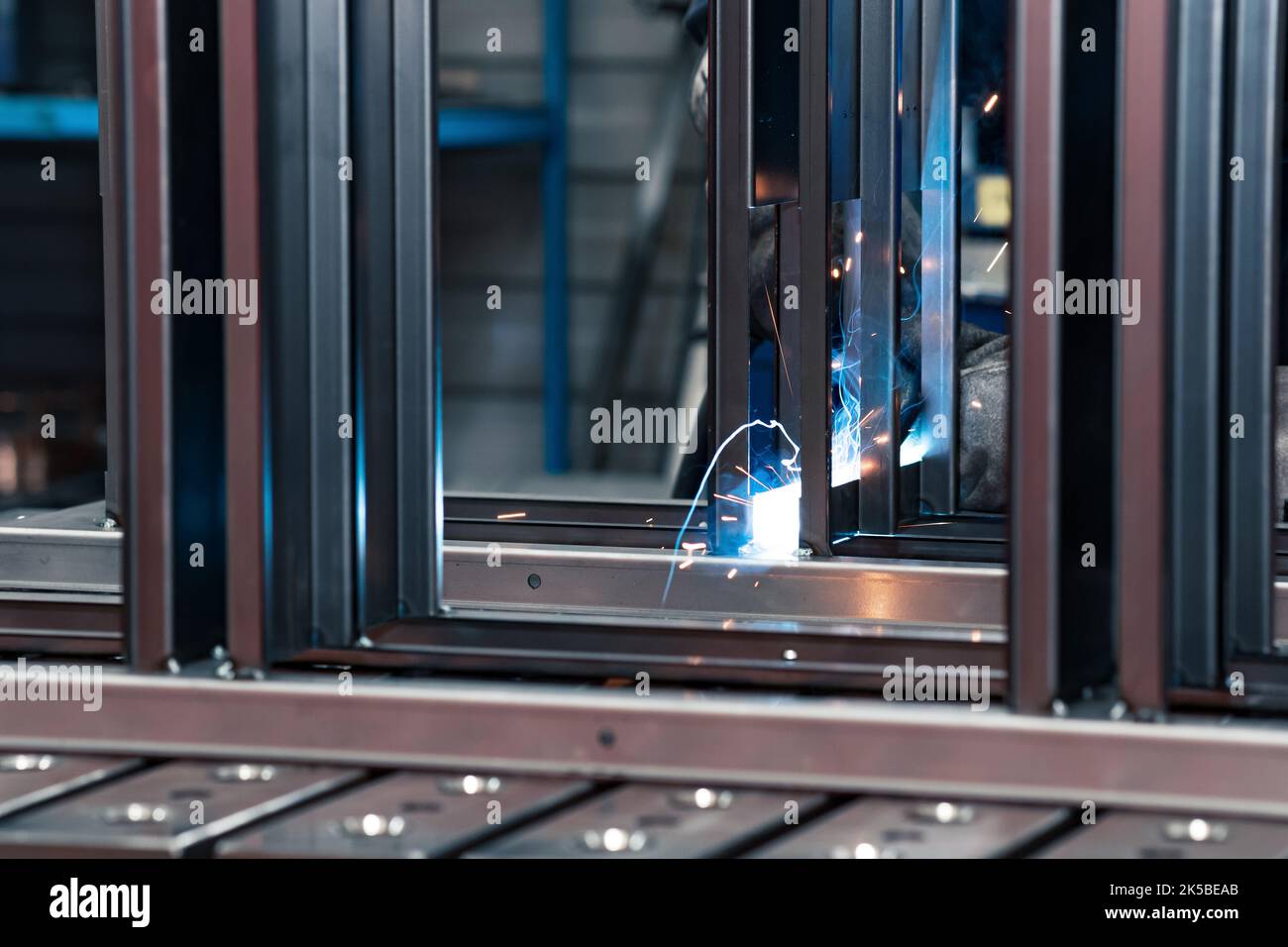 Welding metal structures sparks smoke hi-res stock photography and ...