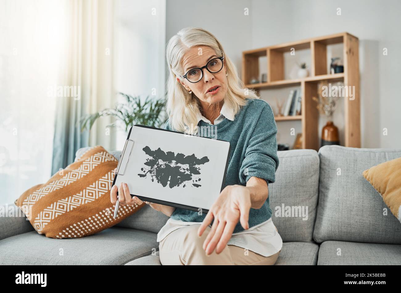 Inkblot test, therapy and mature psychologist talking about mental ...