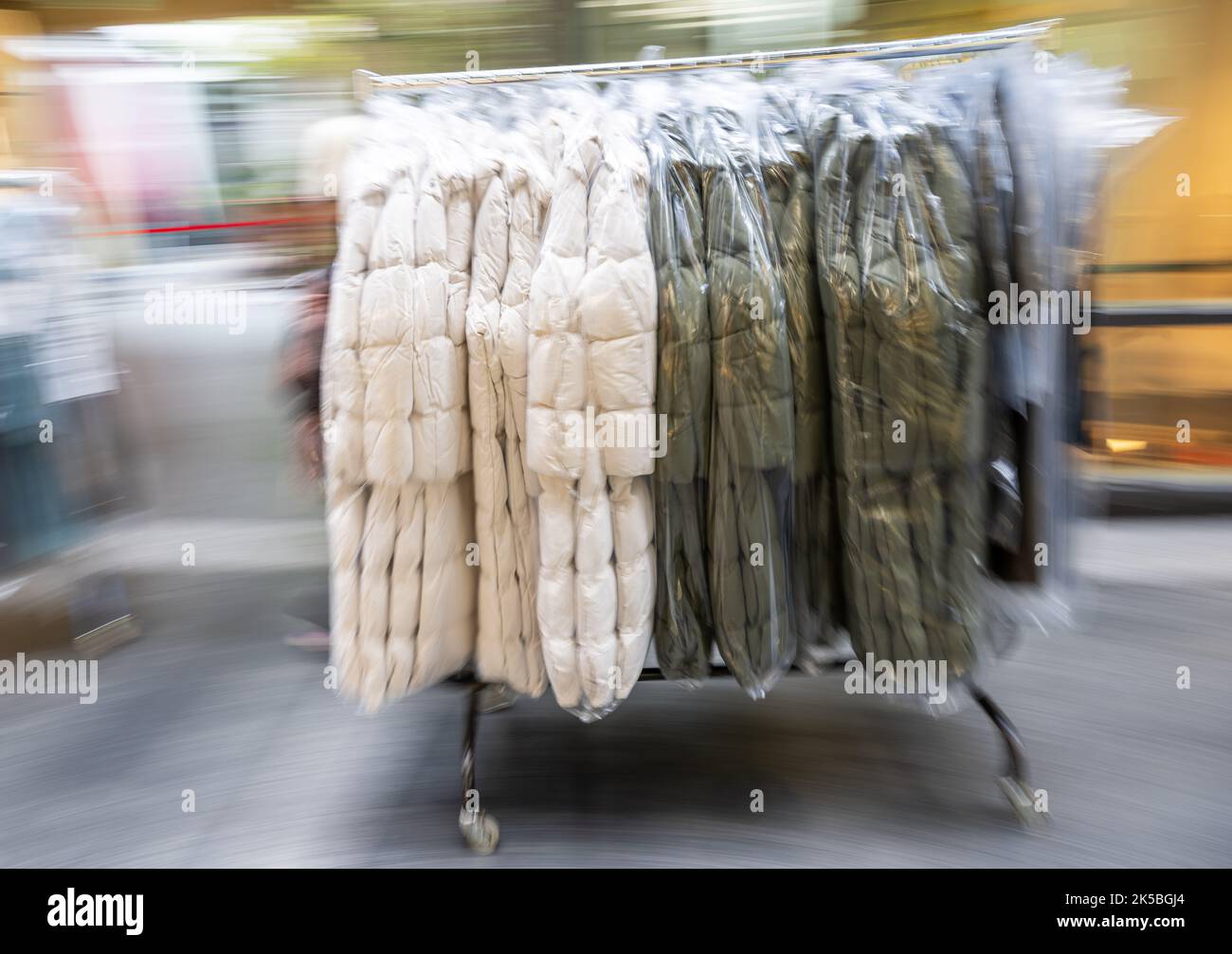 Munich, Germany. 07th Oct, 2022. Winter coats on a transport device are ...
