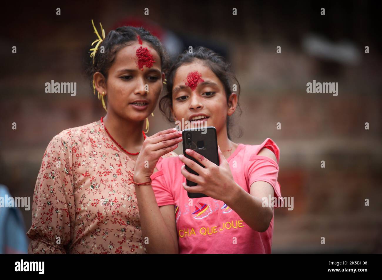 Kathmandu, Bagmati, Nepal. 7th Oct, 2022. Small girls gesture as they ...