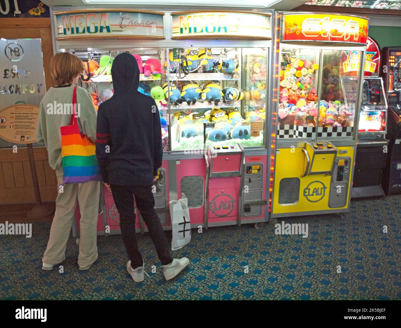 Fun in a games arcade in Brighton Stock Photo - Alamy