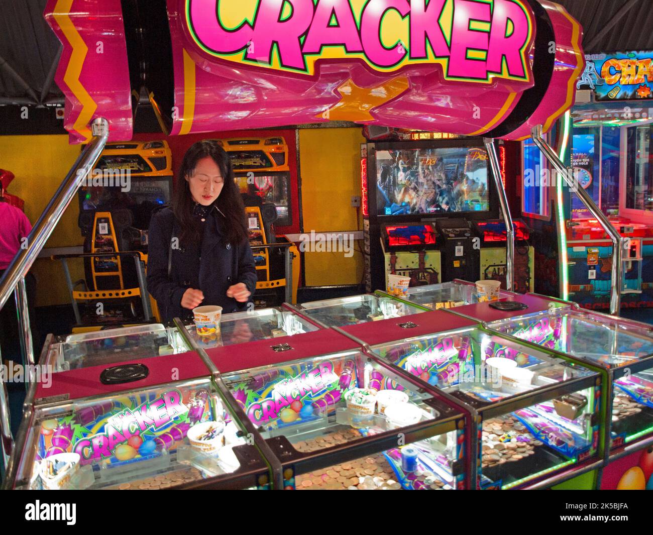 Fun in a games arcade in Brighton Stock Photo - Alamy
