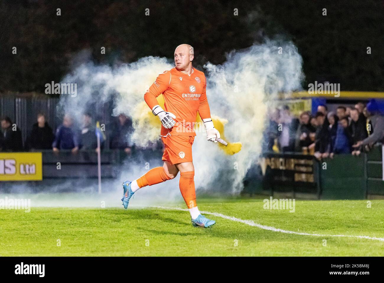 Flares are thrown on the pitch at a football 'Derby' match in ...