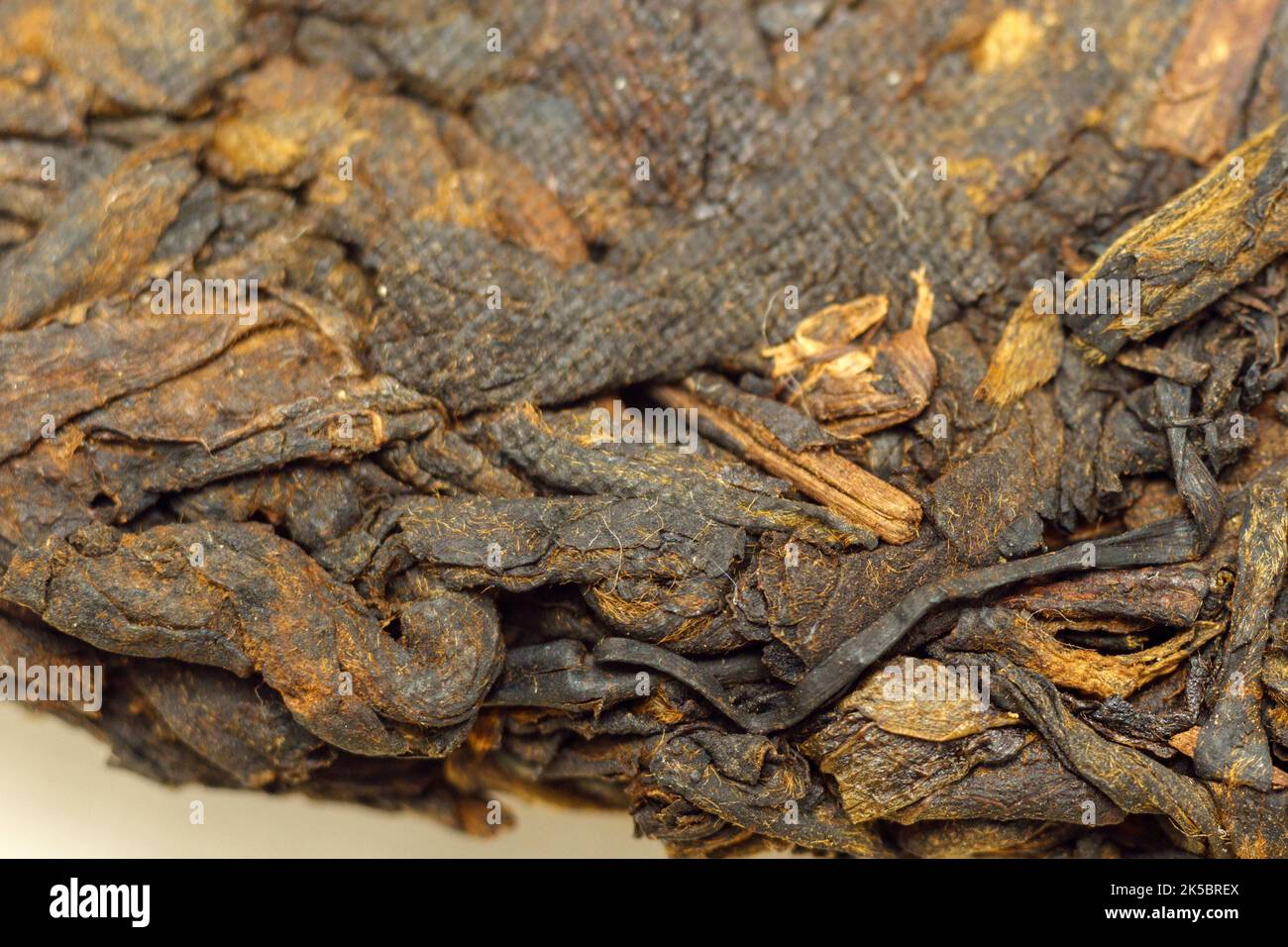Chinese pressed pu erh tea, close-up, macro, tea ceremony. Selective ...