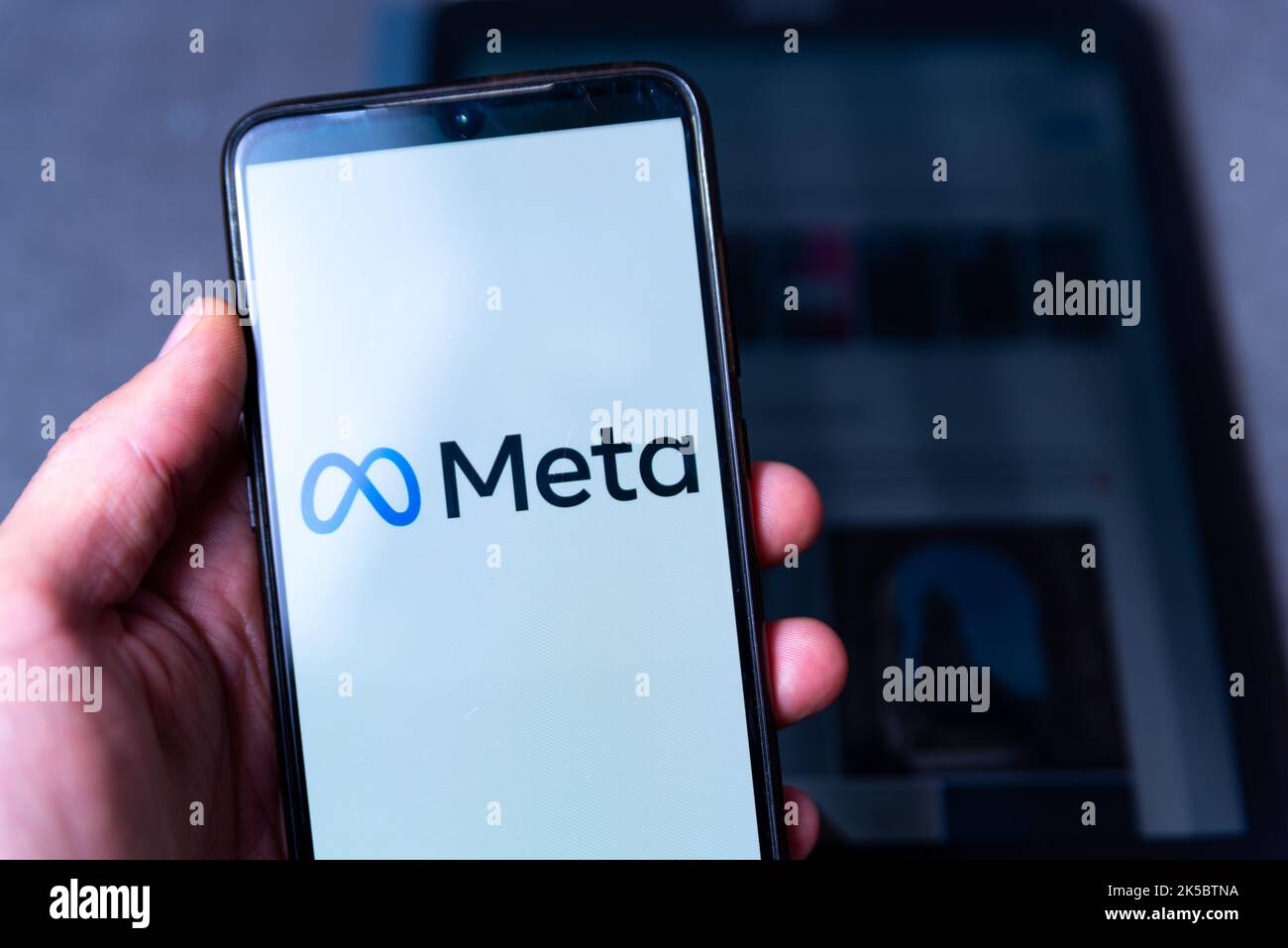 In this photo illustration the logo of the company Meta is seen on the ...