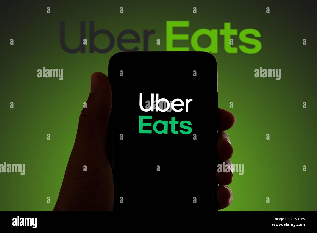 In this photo illustration the logo of the food delivery service Uber ...