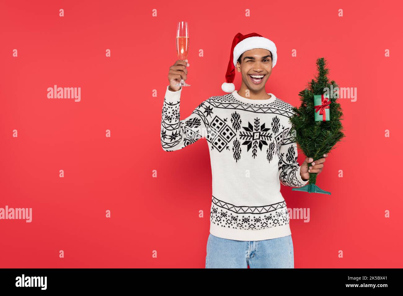 Winking man with champagne hi-res stock photography and images - Alamy