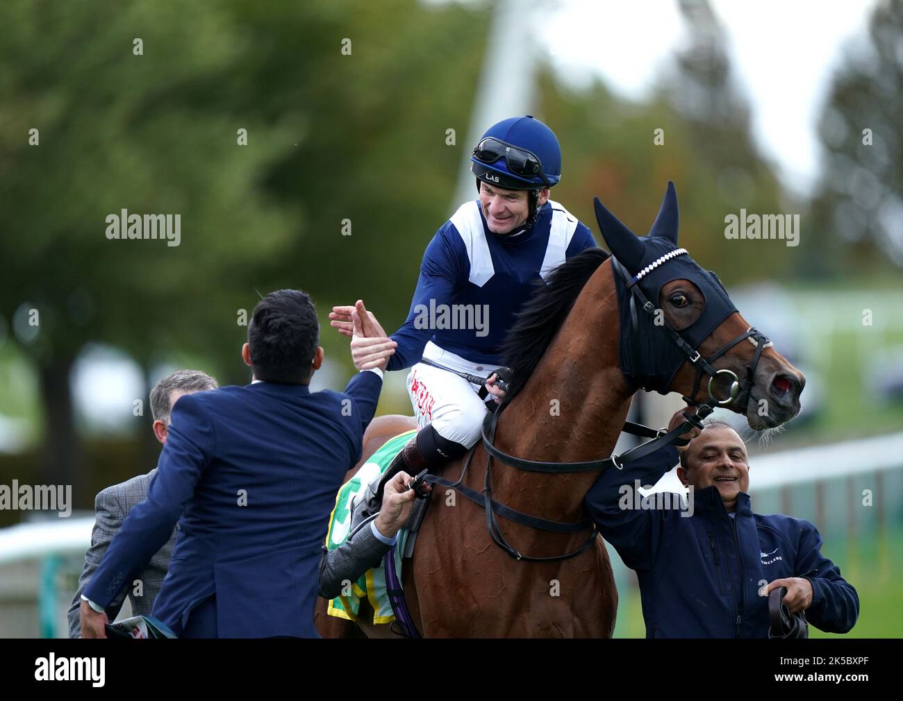 Robert Havlin celebrates winning the bet365 Fillies' Mile with ...