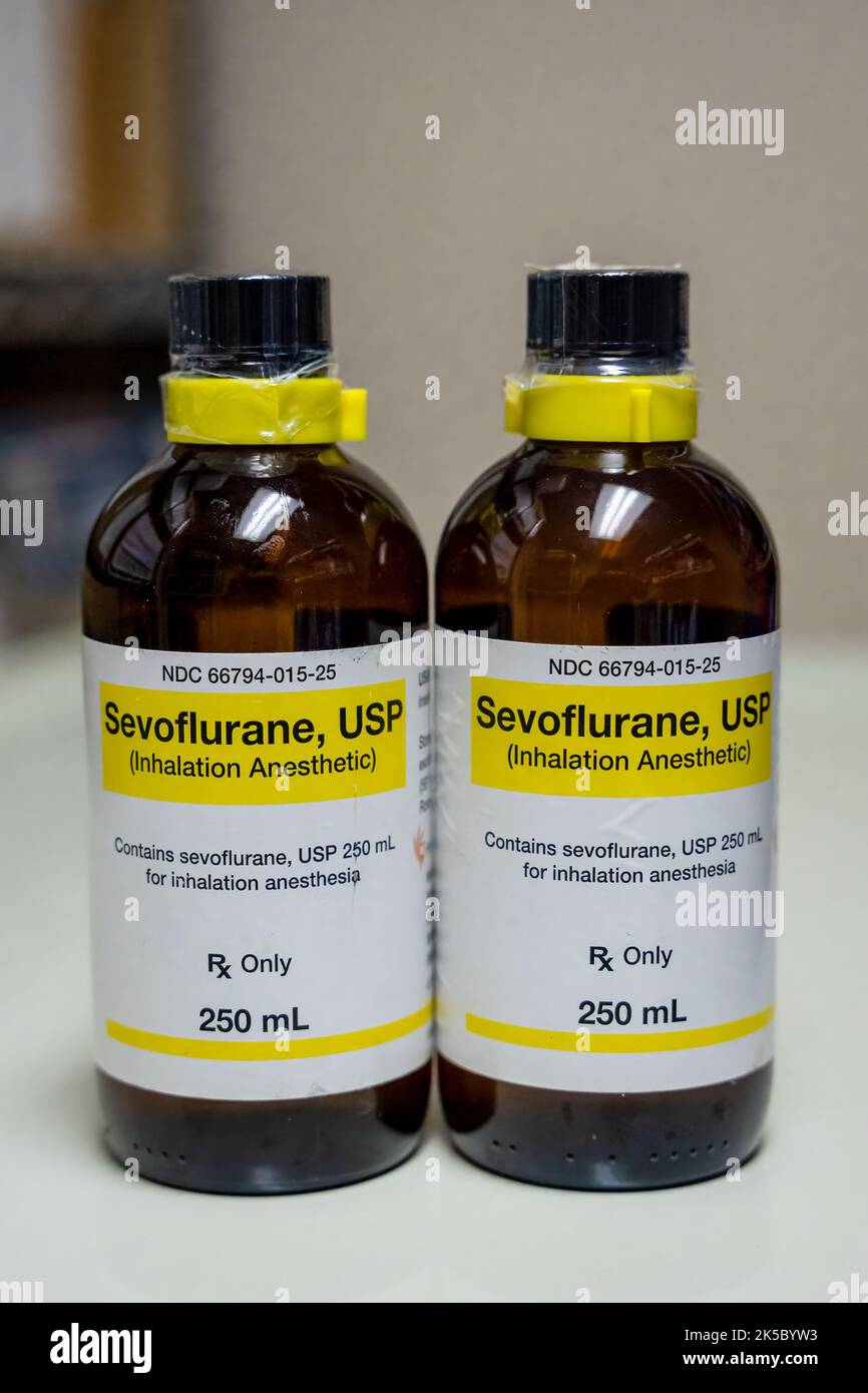 The vertical view of two bottles of sevoflurane, USP 250ml over the ...
