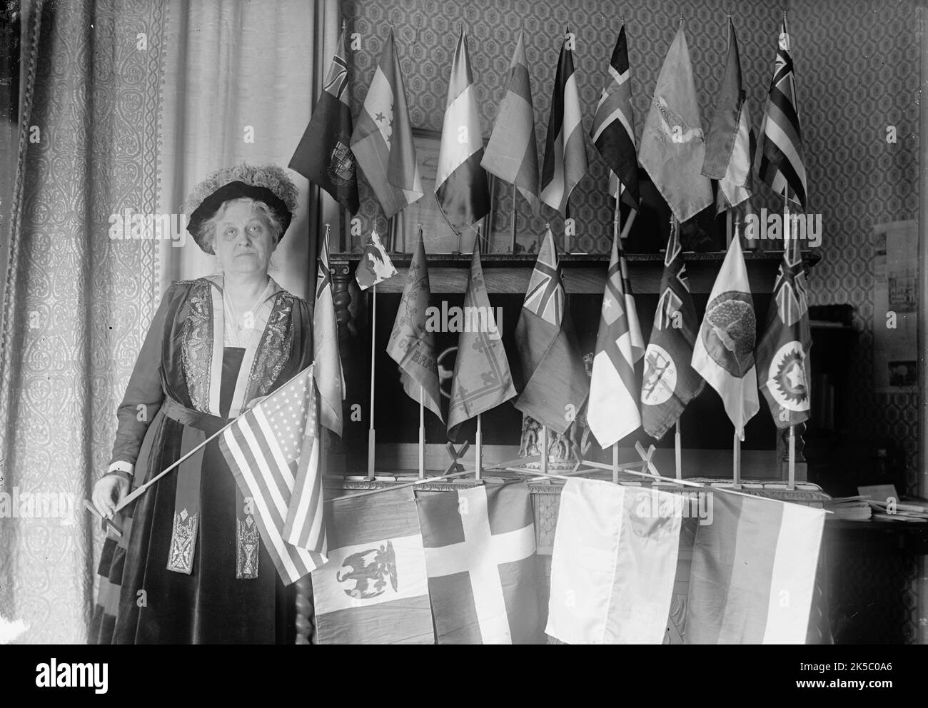 Mrs. Carrie Chapman Catt with Flags of 22 Nations, 1917. American women ...