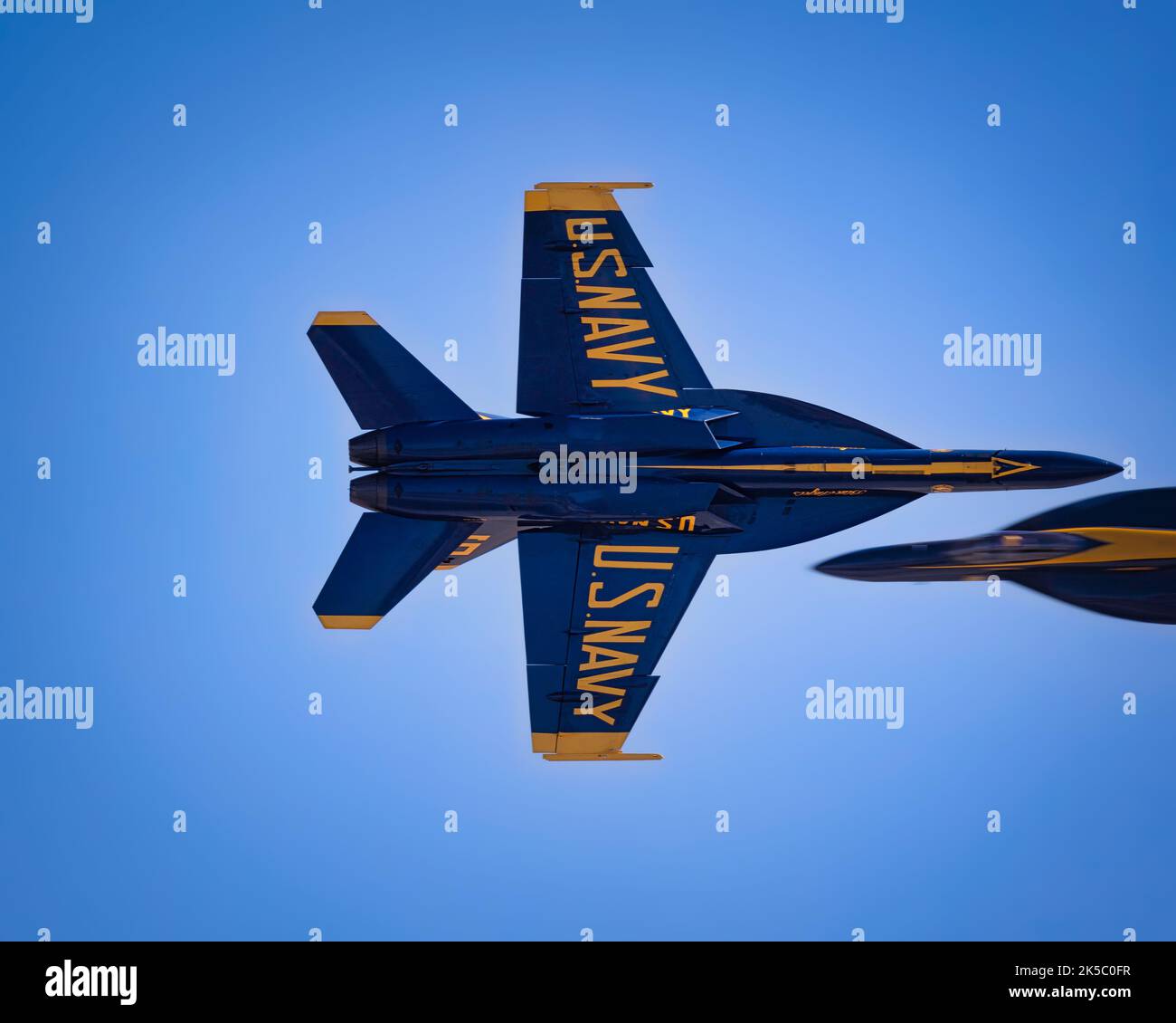 The bottom of a Blue Angel perform the Opposing Knife Edge Pass at the ...