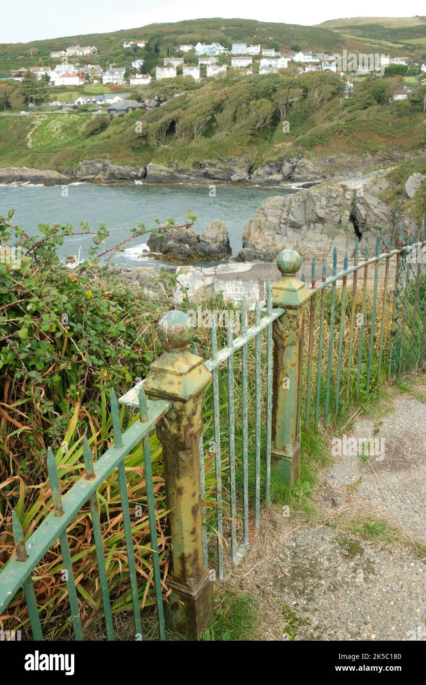 A rusted iron railing and gateway to the derelict lido in Port Erin ...