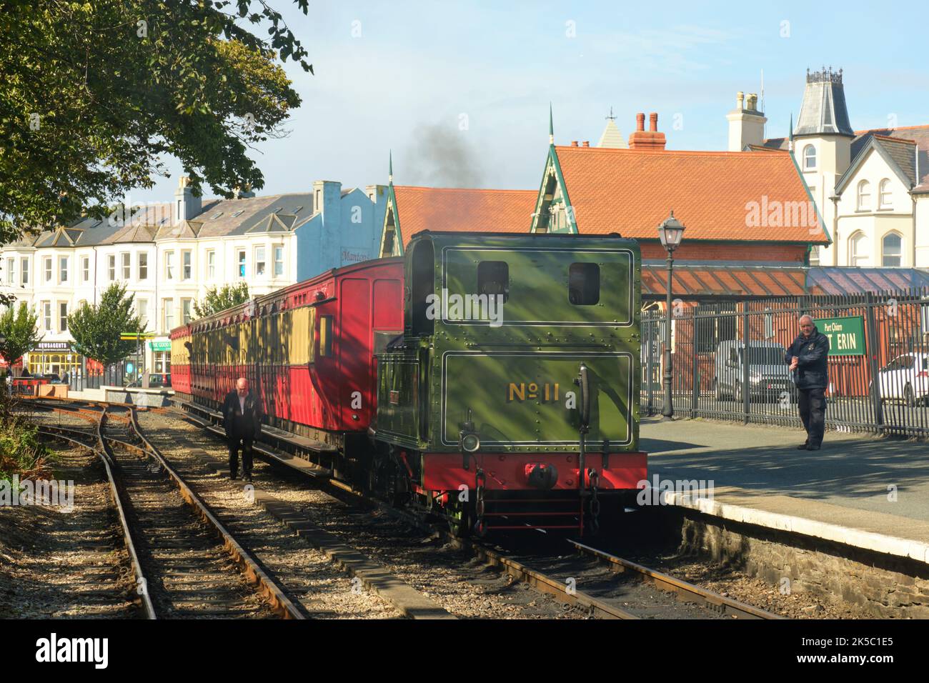 A narrow-gauge steam railway engine waiting in Douglas station, Isle of ...