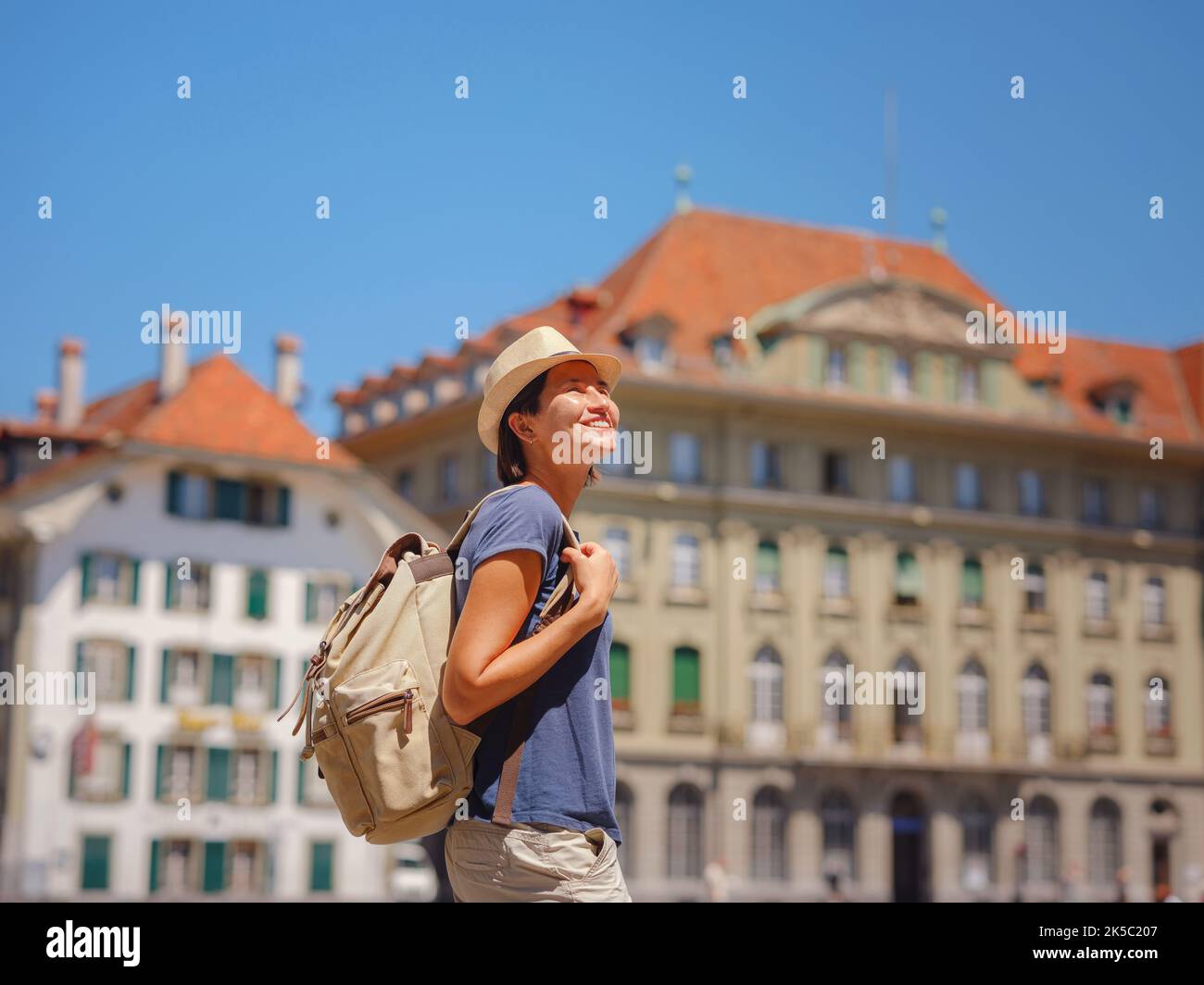 Woman having a great vacation in Switzerland, BErn, Federal palace ...