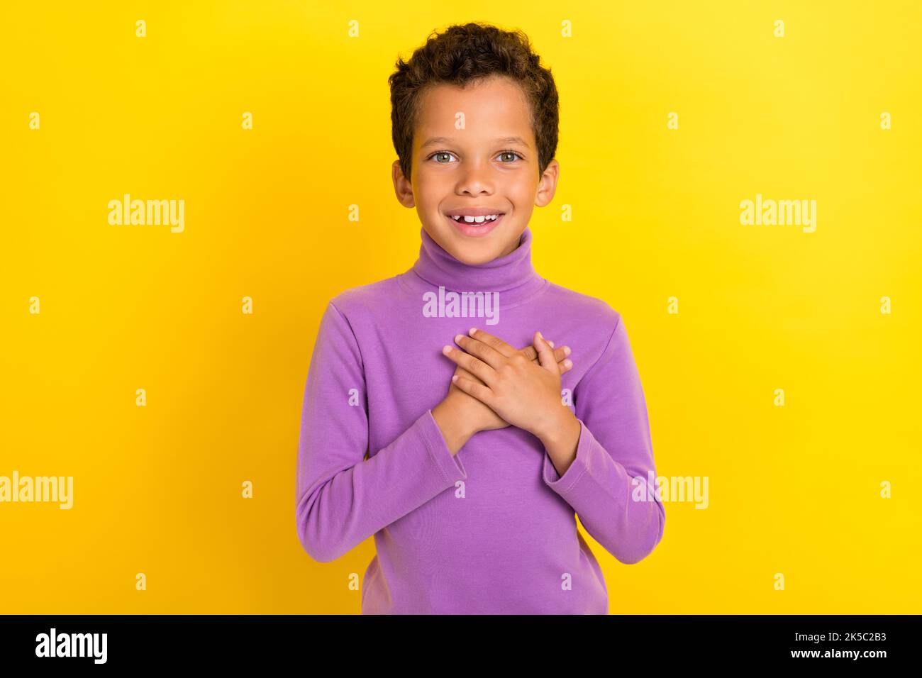 Photo of cheerful friendly person toothy smile arms touch chest heart ...