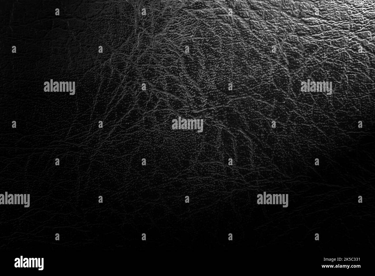 Black leather texture. Abstract background of dark leather with small ...