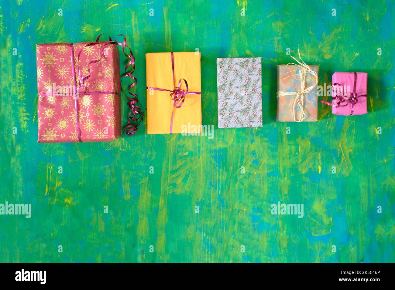 christmas gifts in a row, wrapped presents, merry christmas,making a ...