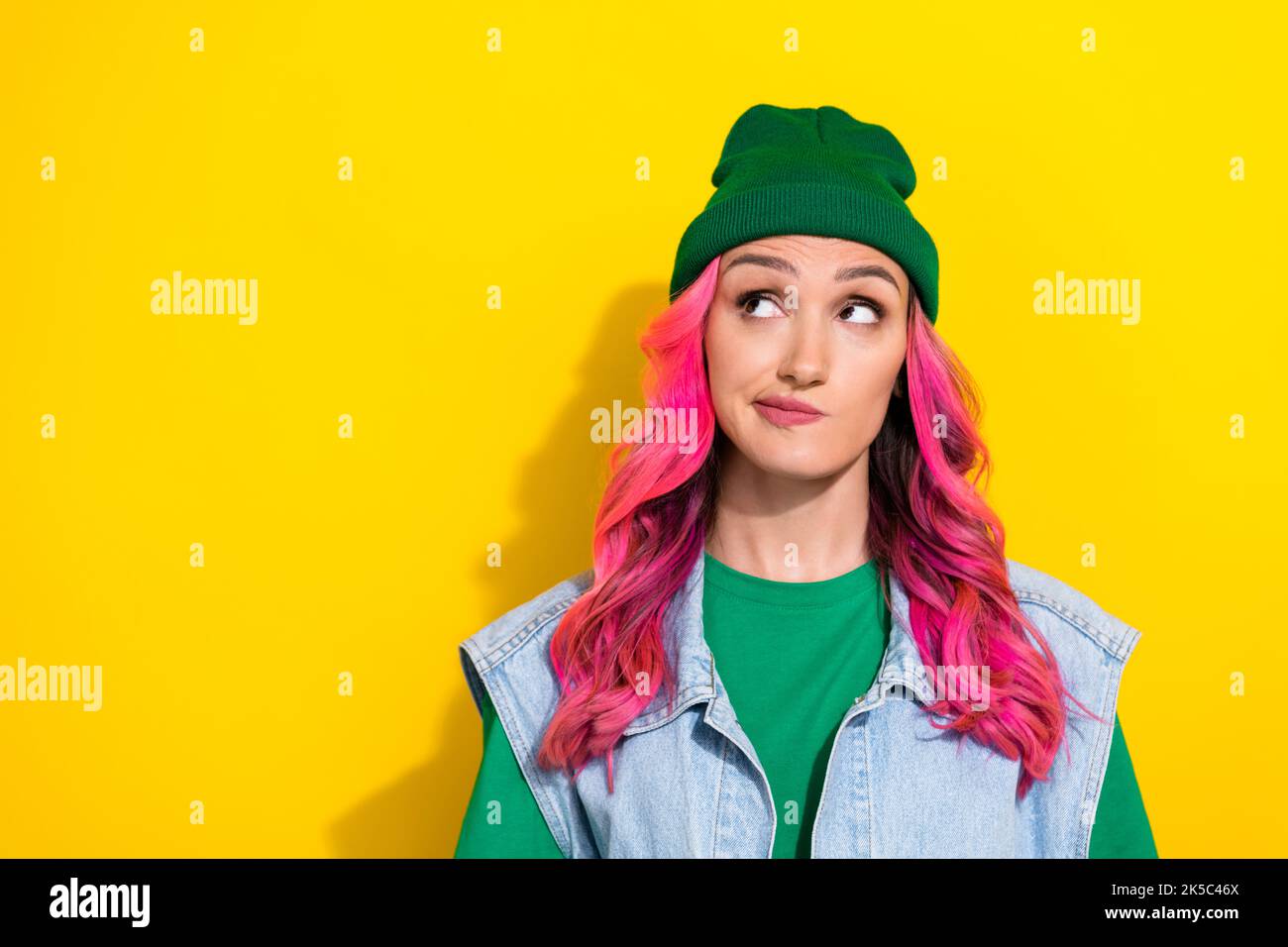 Photo of pretty girlish interested girl with pink hairdo dressed denim ...