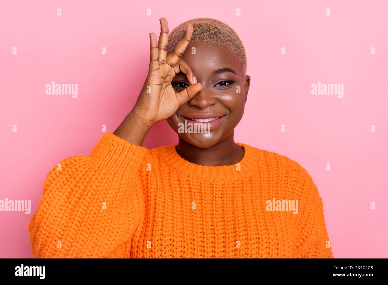 Photo of nice positive person hand demonstrate okey symbol near eye ...
